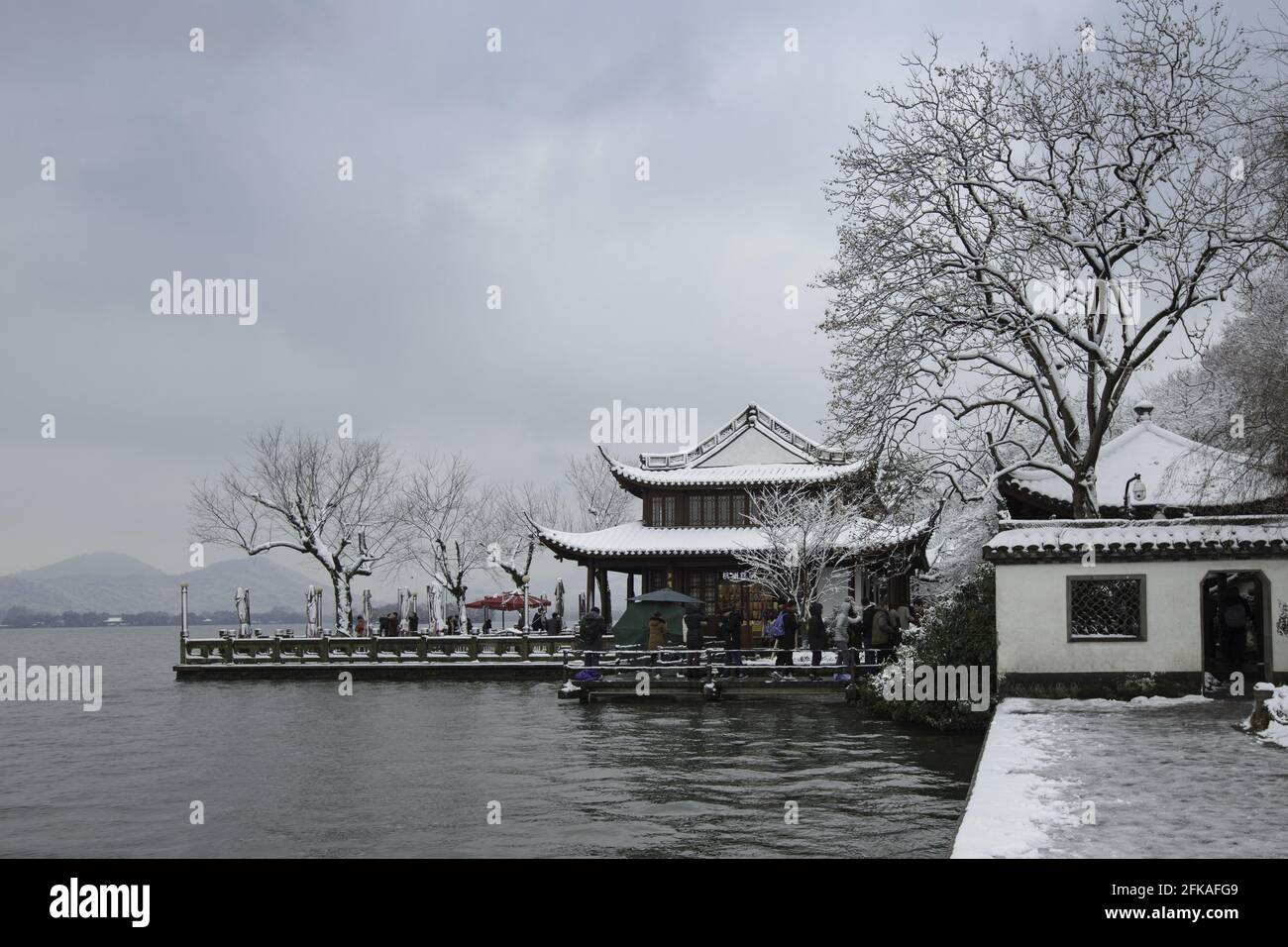 Hangzhou west lake scenery after a snow Stock Photo - Alamy