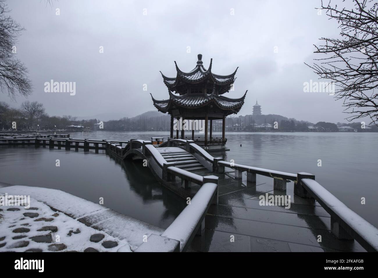 Hangzhou west lake scenery after a snow Stock Photo - Alamy