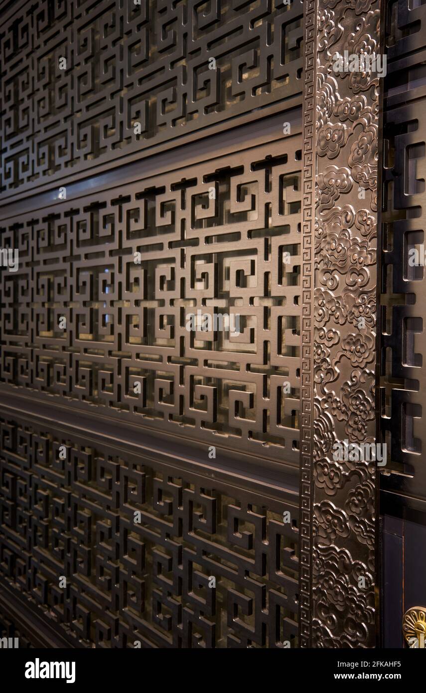 Close-up of a dark golden metal gate pattern Stock Photo - Alamy