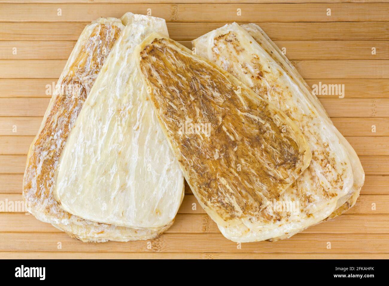 Closeup of dried Dong quai, Dang Gui, known as female ginseng ...