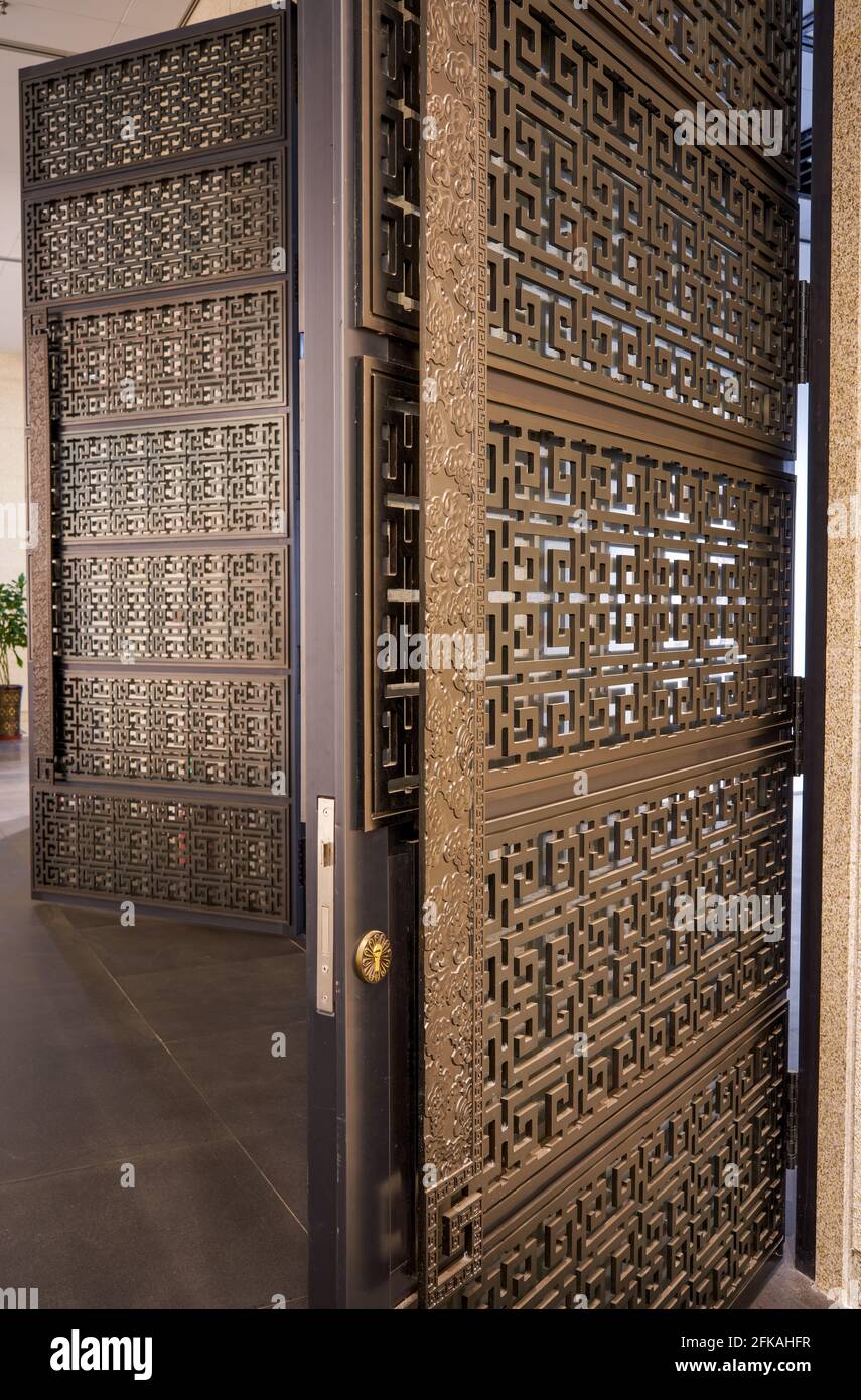 Close-up of a dark golden metal gate pattern Stock Photo - Alamy