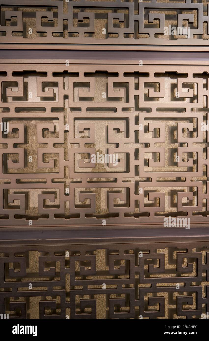 Close-up of a dark golden metal gate pattern Stock Photo - Alamy