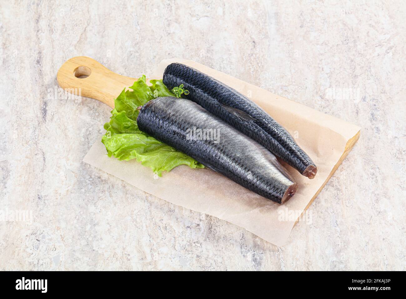 Marinated Herring fillet with skin for cooking Stock Photo - Alamy
