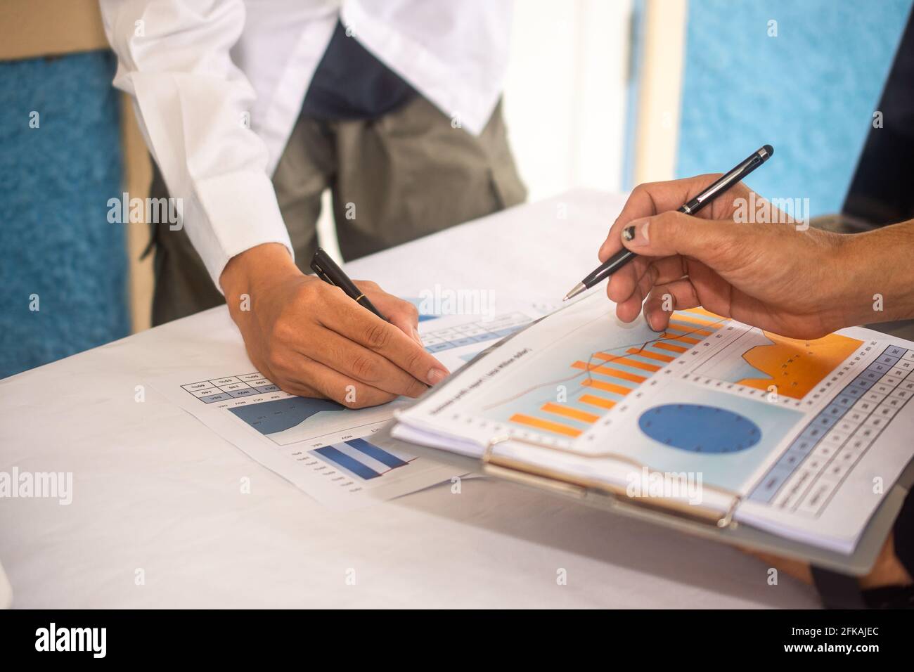 Business teamwork meeting with paper document business in office Stock ...