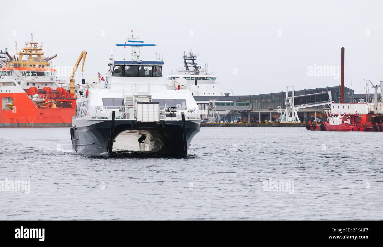 Catamaran fast passenger ferry enters the port of Bergen, Norway Stock ...