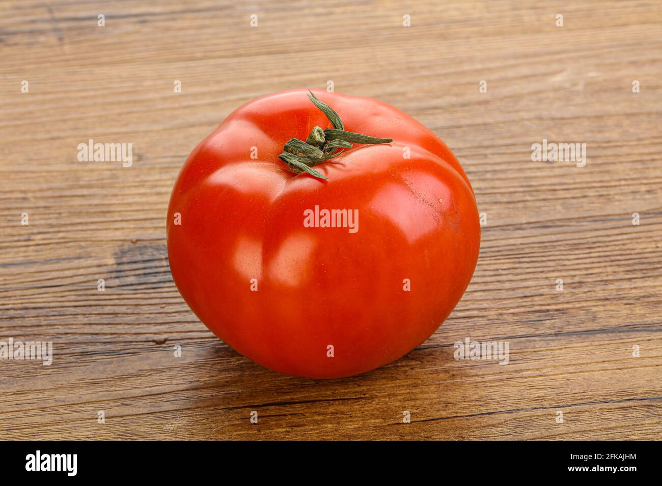 Red ripe big juicy tomato isolated Stock Photo - Alamy
