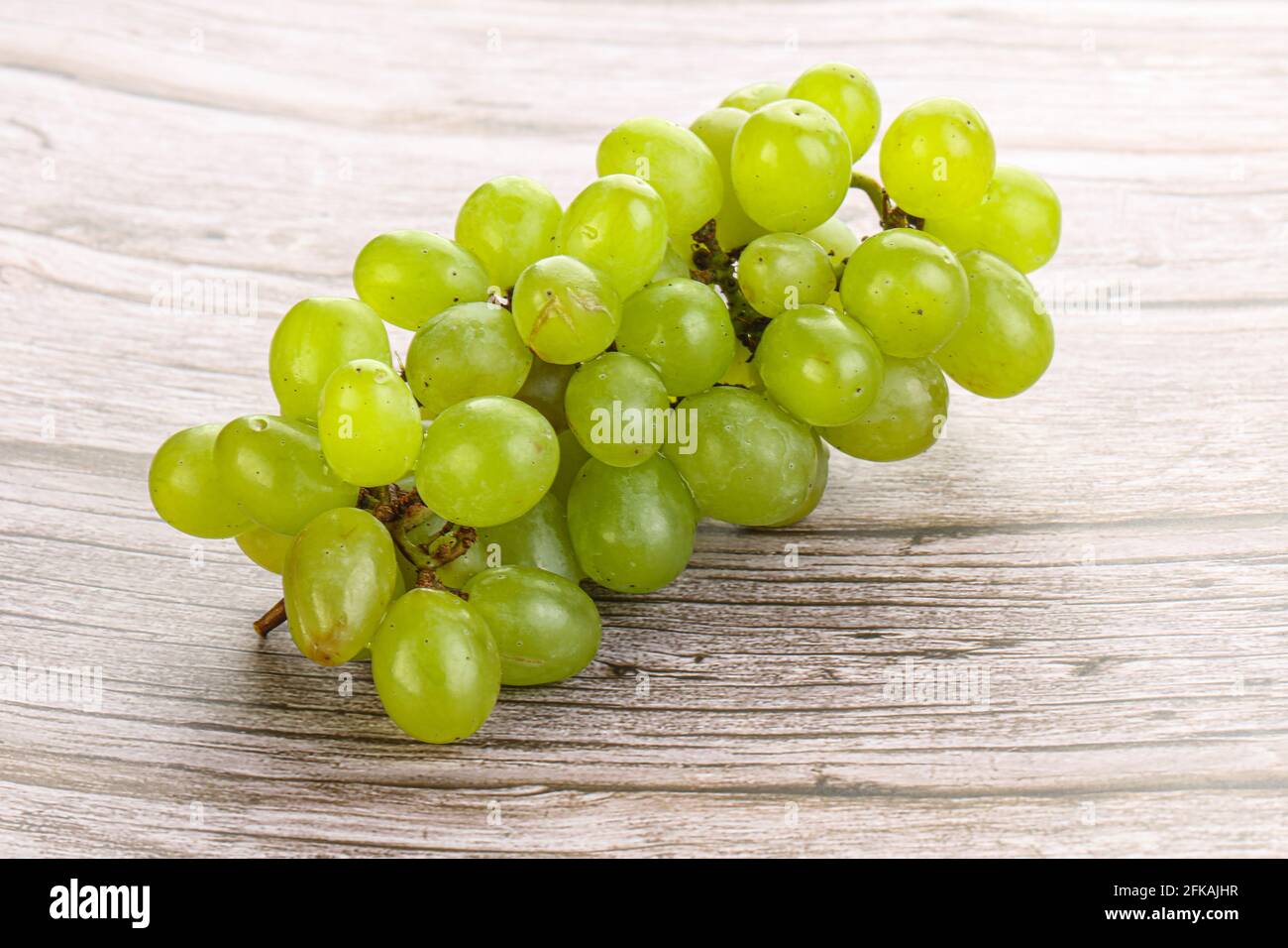 Ripe sweet green grape branch isolated Stock Photo - Alamy
