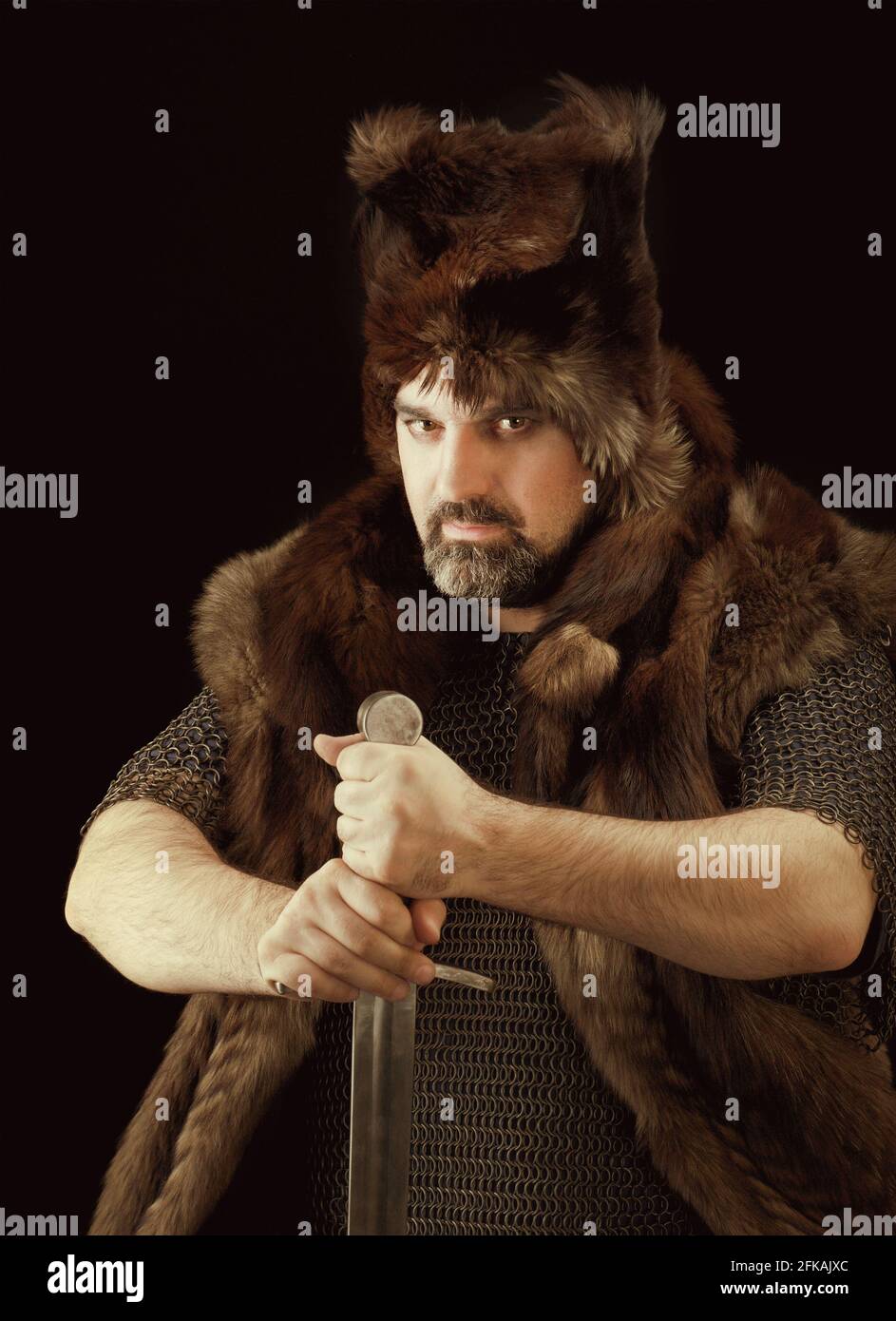 Cimmerian.barbarian Warrior.Medieval knight in the armor with the sword ...