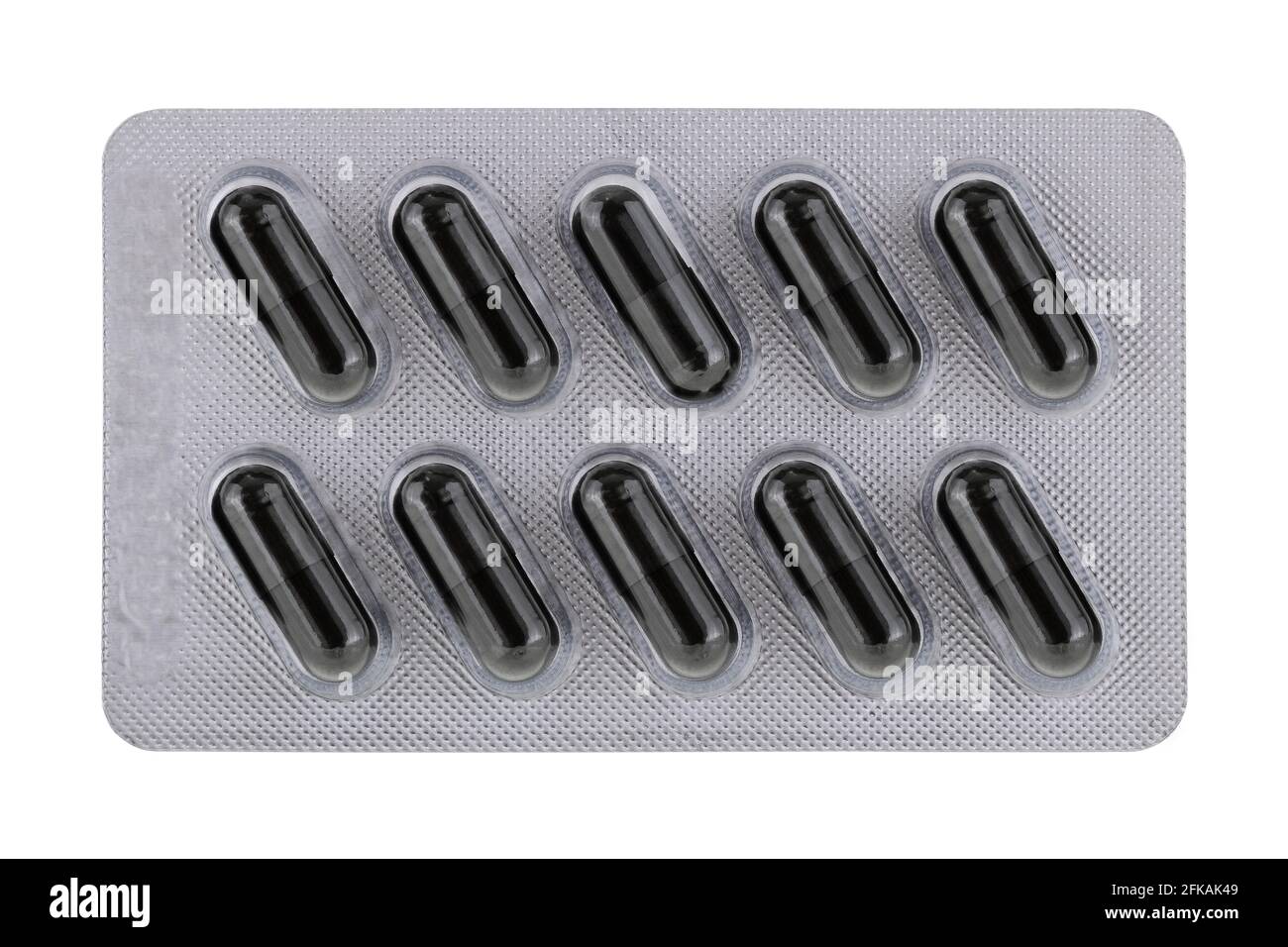 A package full of black capsules with Activated charcoal powder (carbon ...