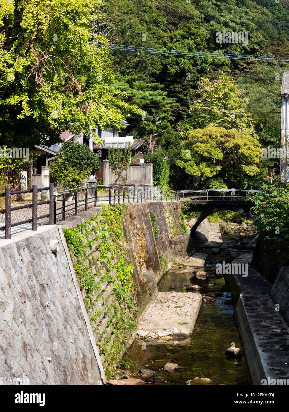 Tranquil riverside walkway in the town of Arita, Saga prefecture, Japan ...
