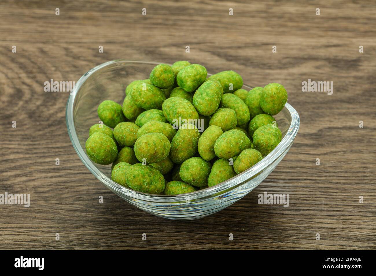 Spicy wasabi peanuts snack in the bowl Stock Photo - Alamy