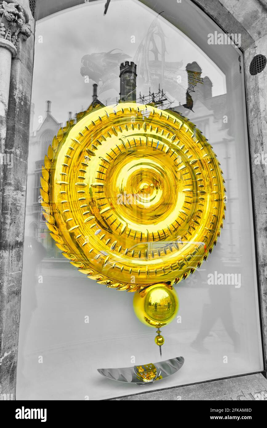 The circular and mechanical gold-plated grasshopper clock, by John ...