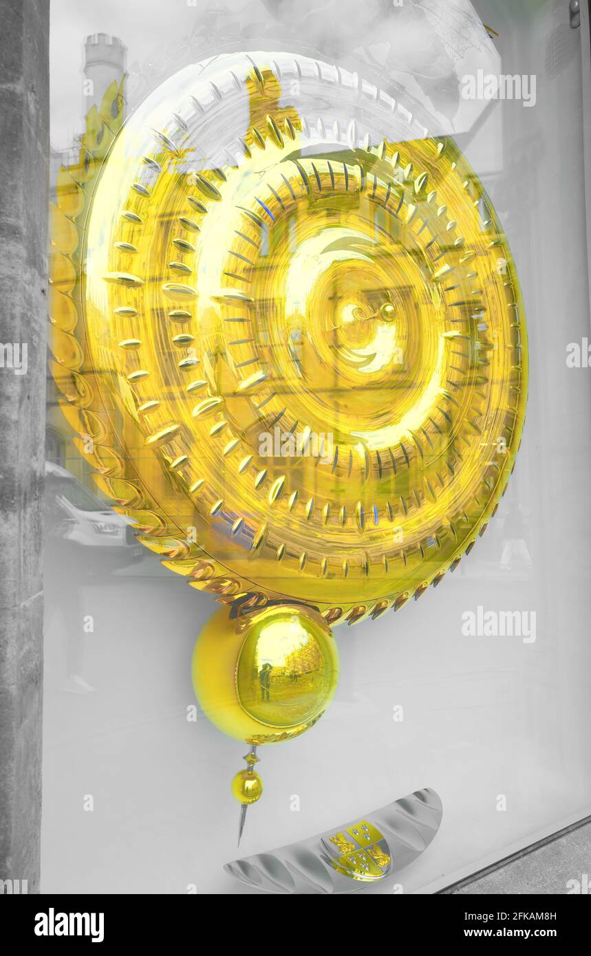 The circular and mechanical gold-plated grasshopper clock, by John ...