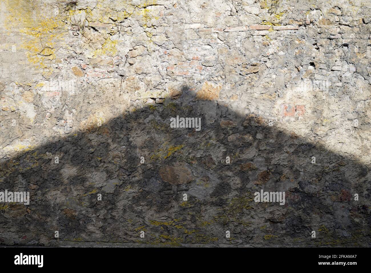Wall made of natural stone built and grouted Stock Photo - Alamy
