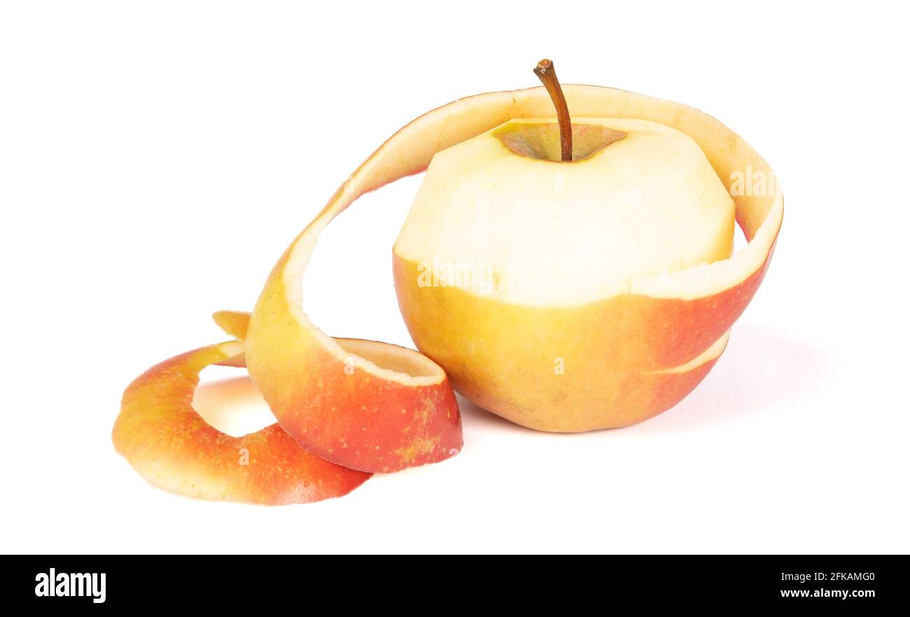 Peeling an apple, isolated over white background Stock Photo - Alamy