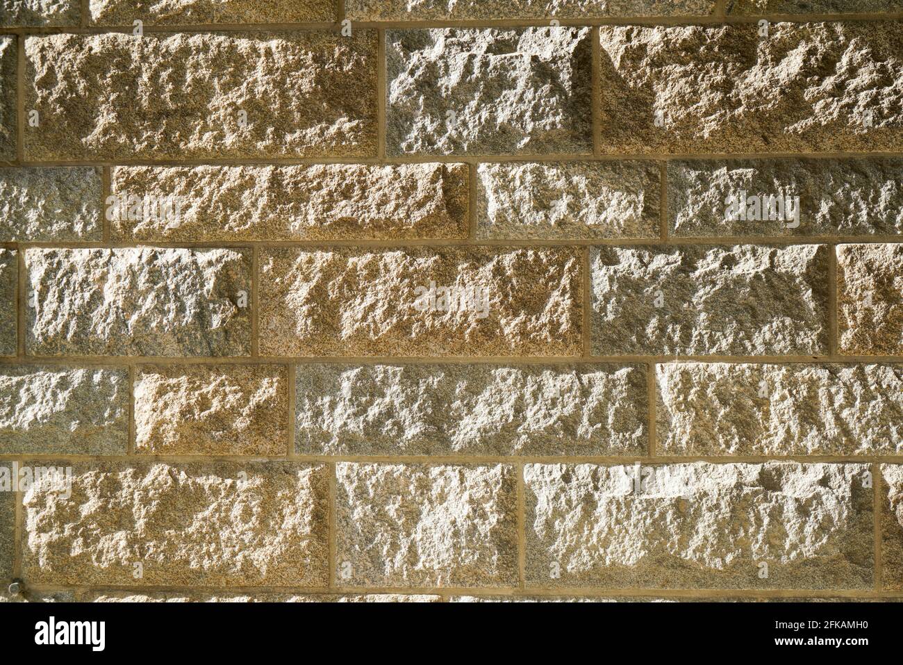 Wall made of natural stone built and grouted Stock Photo - Alamy