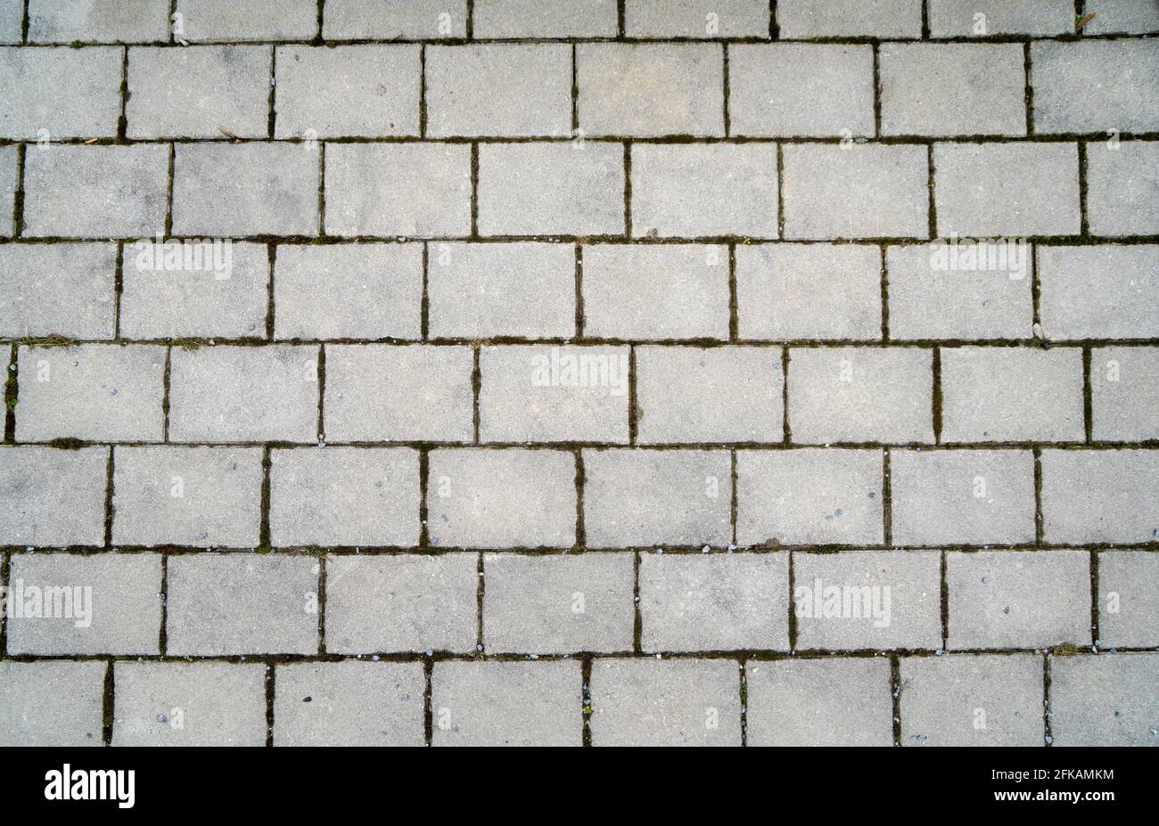 Wall made of natural stone built and grouted Stock Photo - Alamy