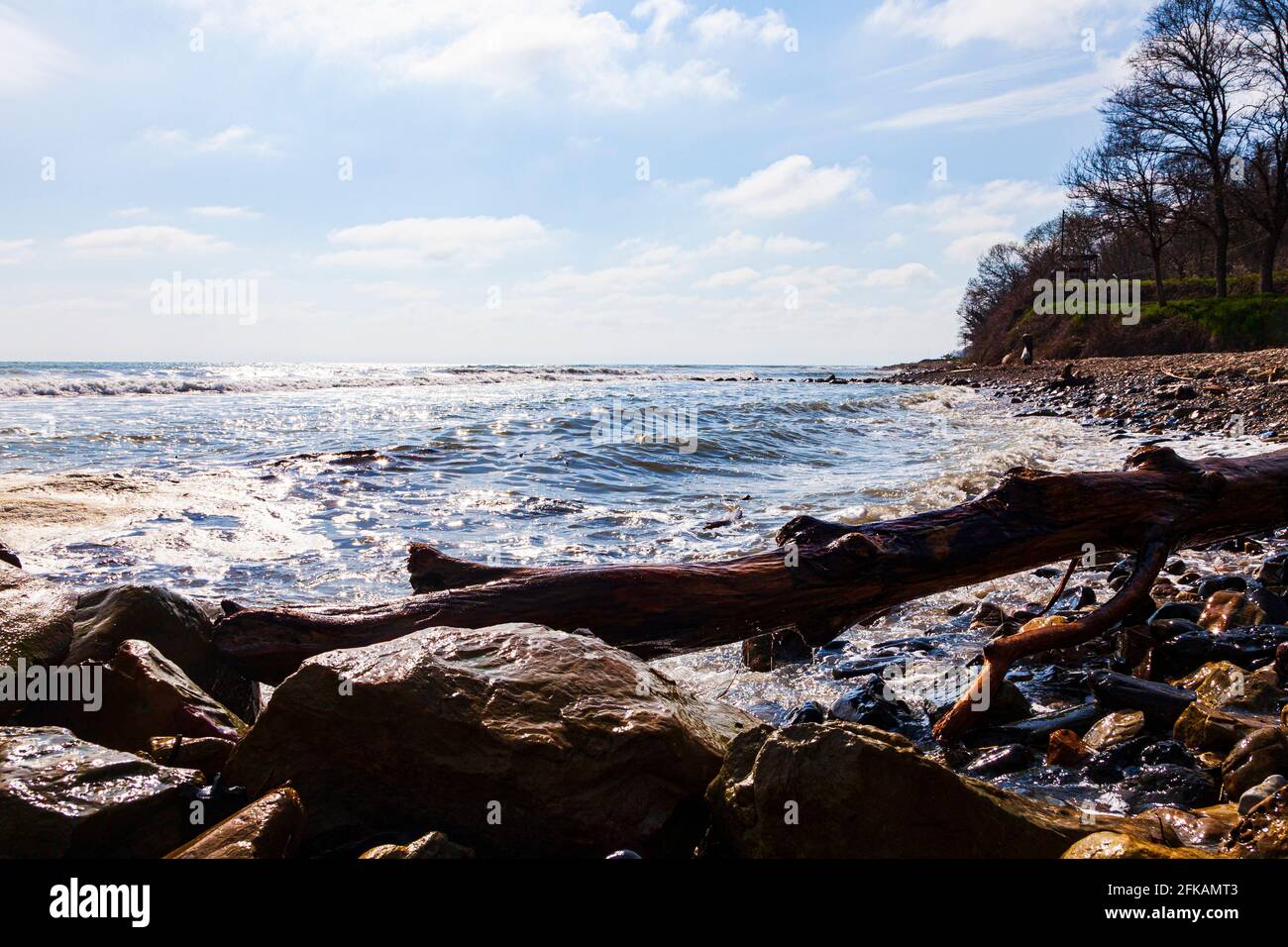 Beautiful seascape. Big rocks and surf Stock Photo - Alamy