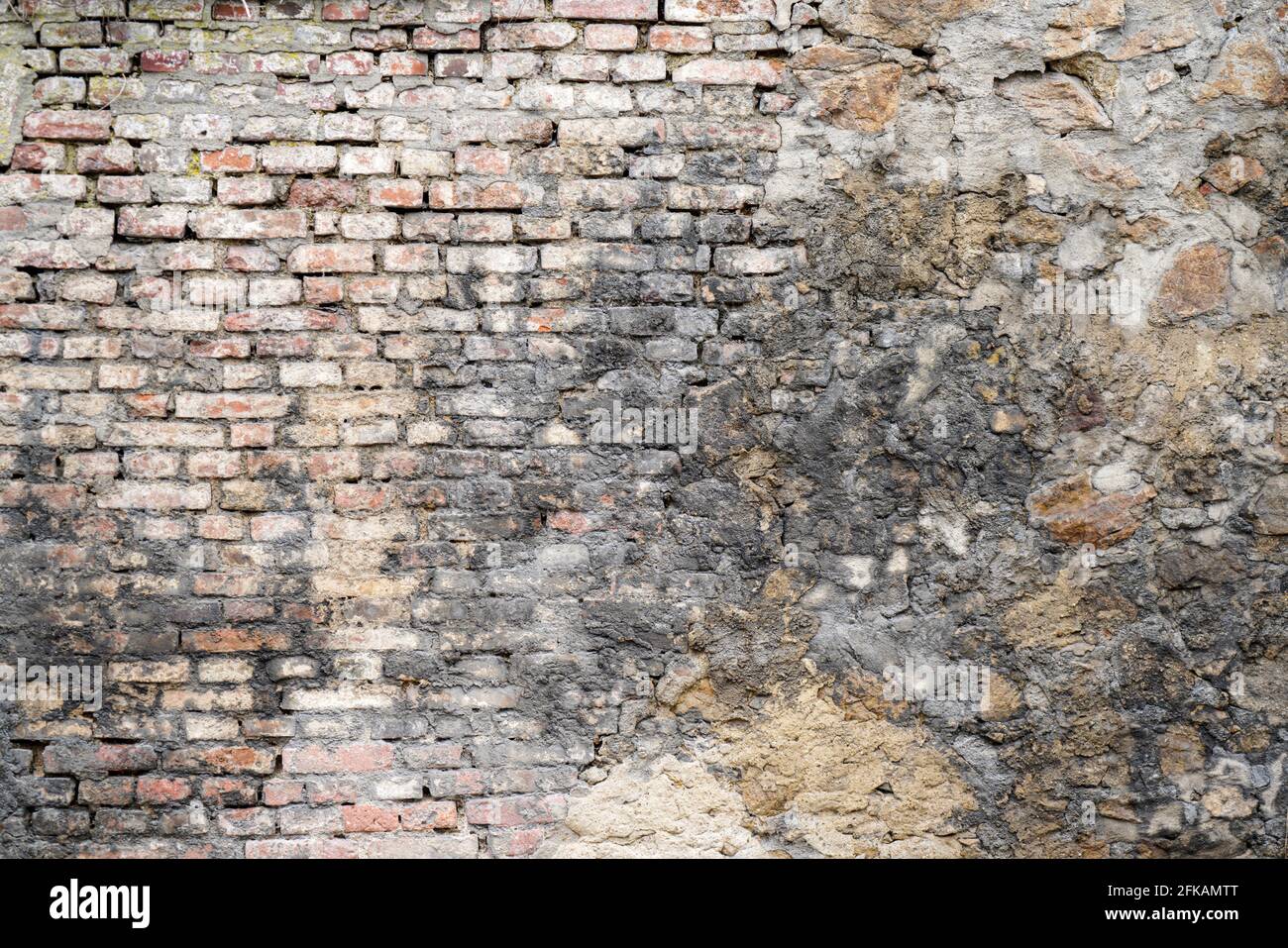 Wall made of natural stone built and grouted Stock Photo - Alamy