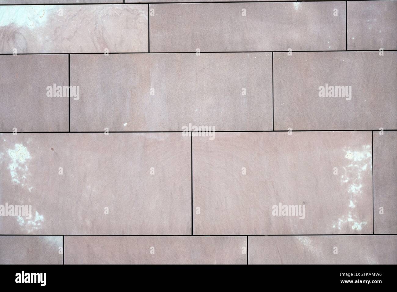 Wall made of natural stone built and grouted Stock Photo - Alamy