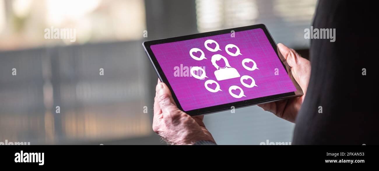 Tablet screen displaying a followers concept Stock Photo - Alamy
