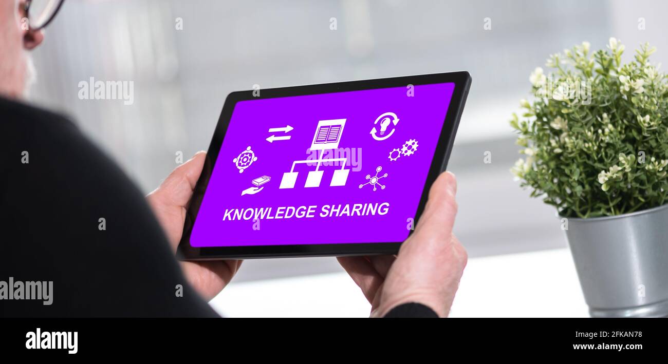 Tablet screen displaying a knowledge sharing concept Stock Photo - Alamy