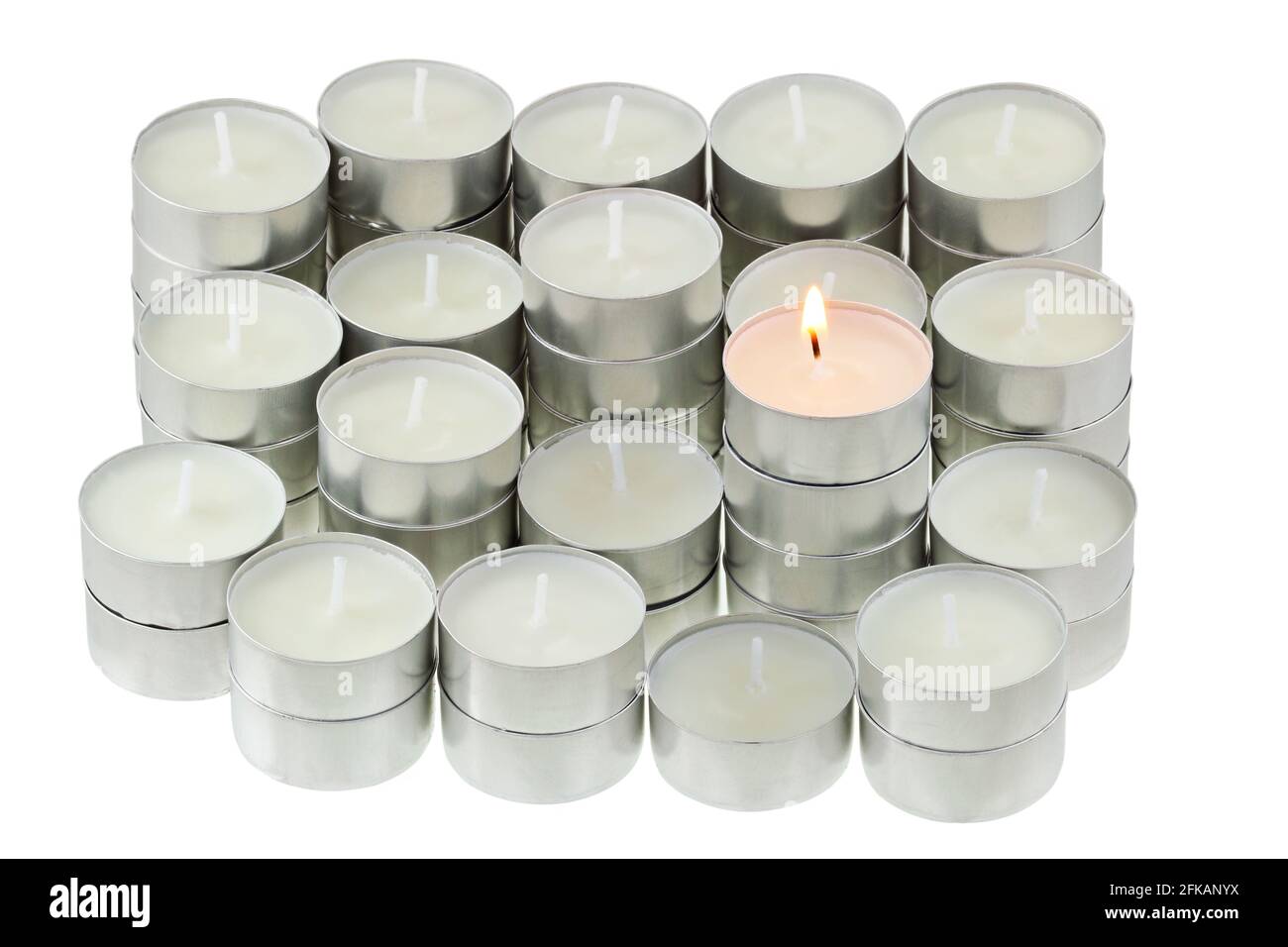 A group of Tea lights isolated on white background Stock Photo - Alamy