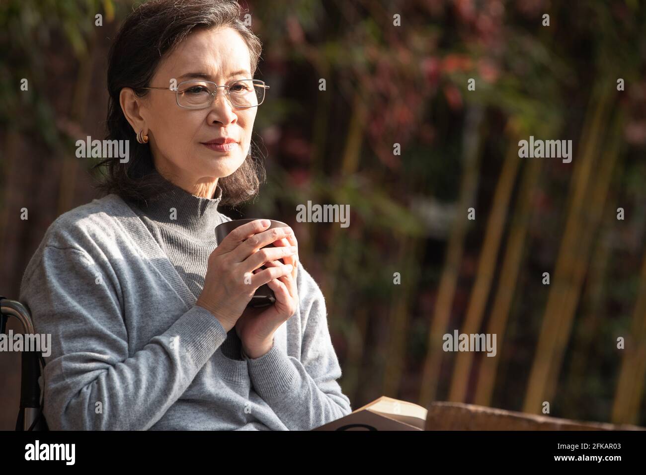 A Lonely Old Woman In The Yard In The Sun Stock Photo Alamy a-lonely-old-woman-in-the-yard-in-the-sun-stock-photo-alamy