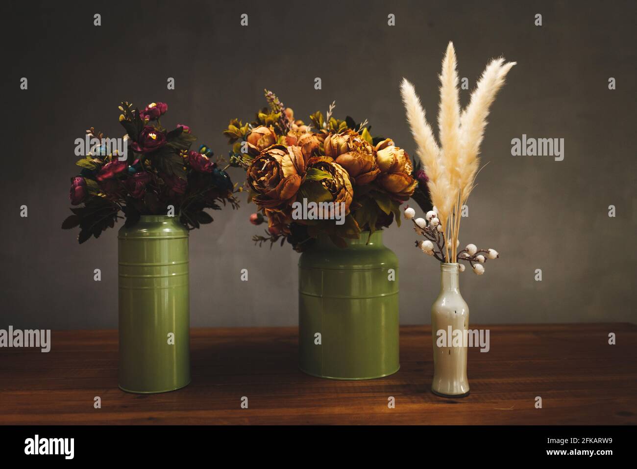 still life of various flowers. photo of flowers in pots with light ...