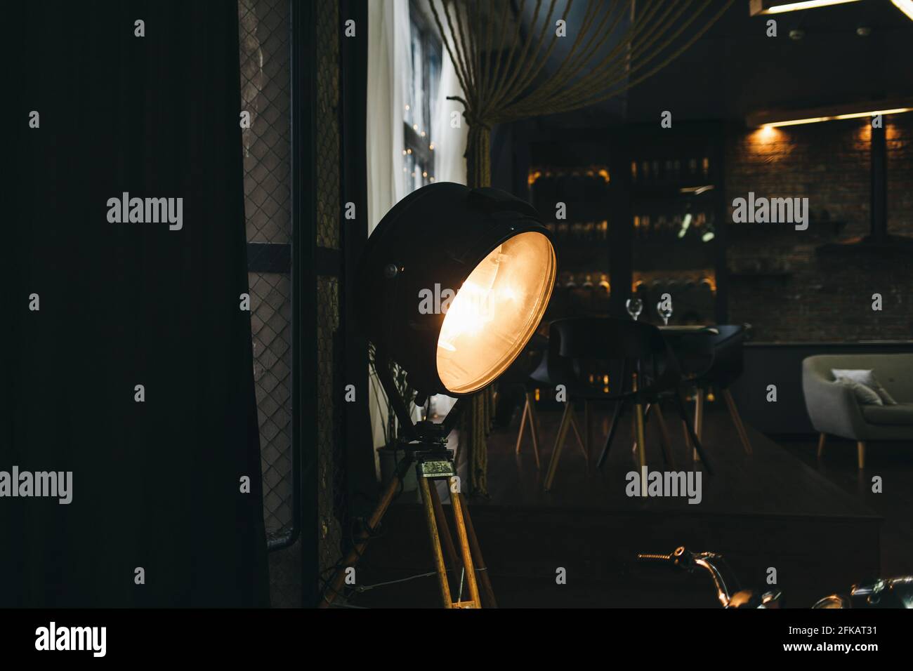 Loft dark interior. Vintage light source lamp Stock Photo - Alamy