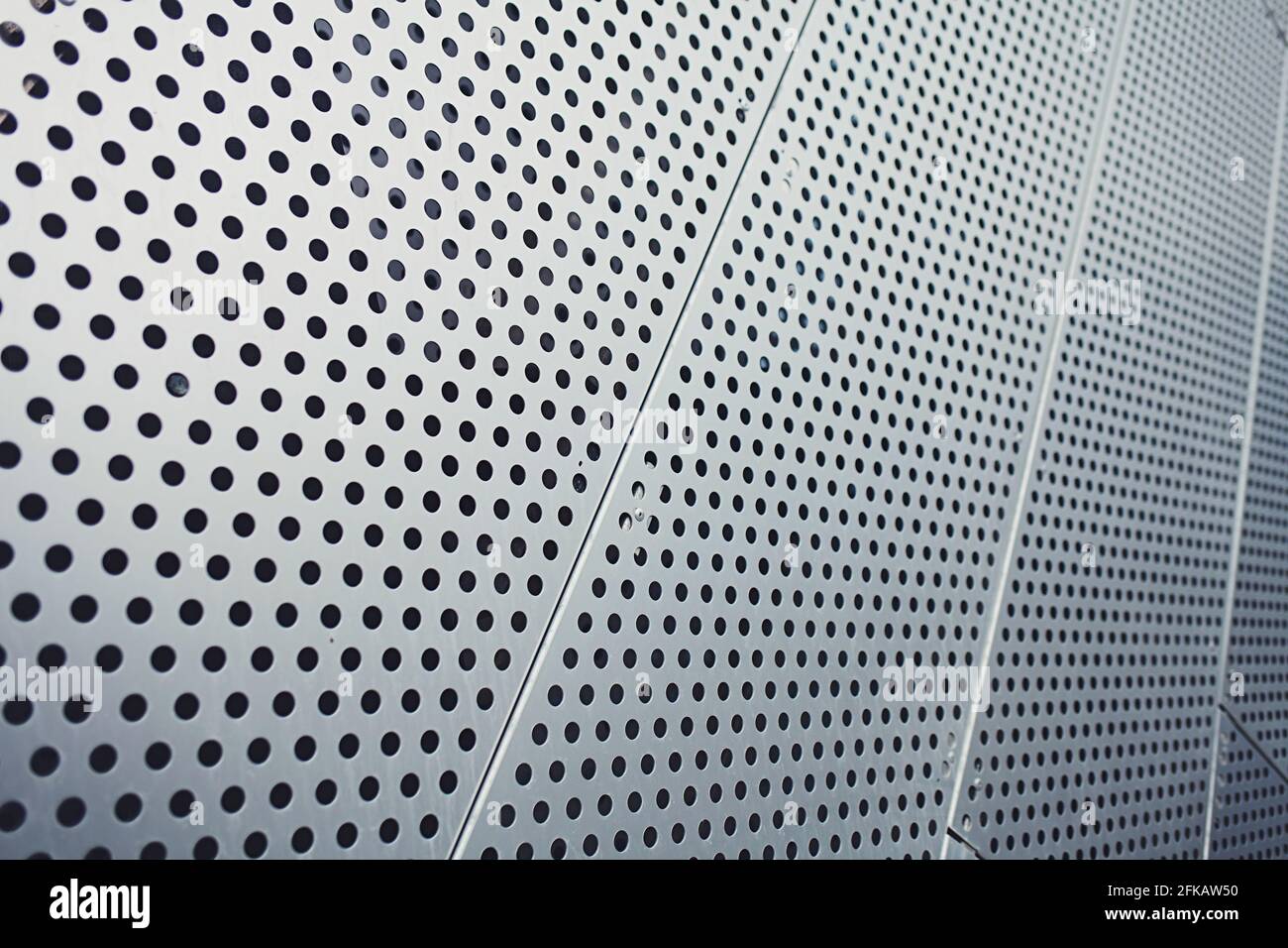 shiny metal panel or texture with circles Stock Photo - Alamy
