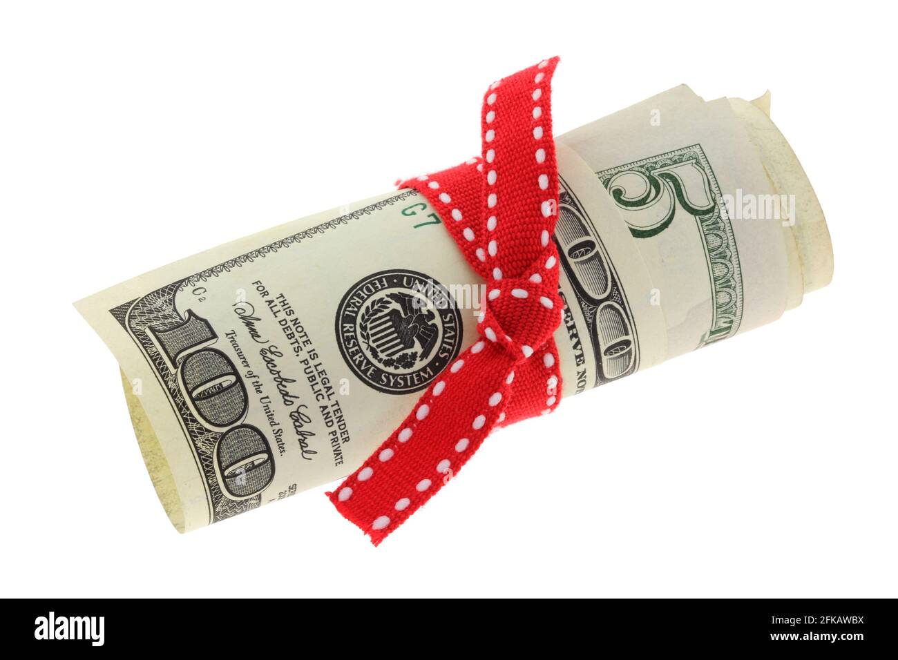 Rolled Dollar banknote with a red ribbon bow Stock Photo - Alamy