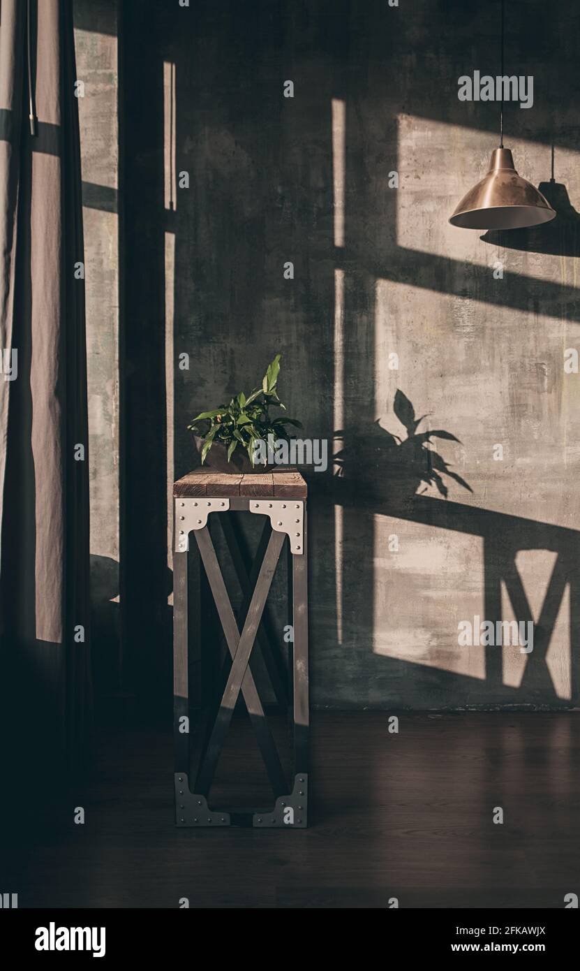 rough loft interior with vintage lamp. light and shadow on the walls ...