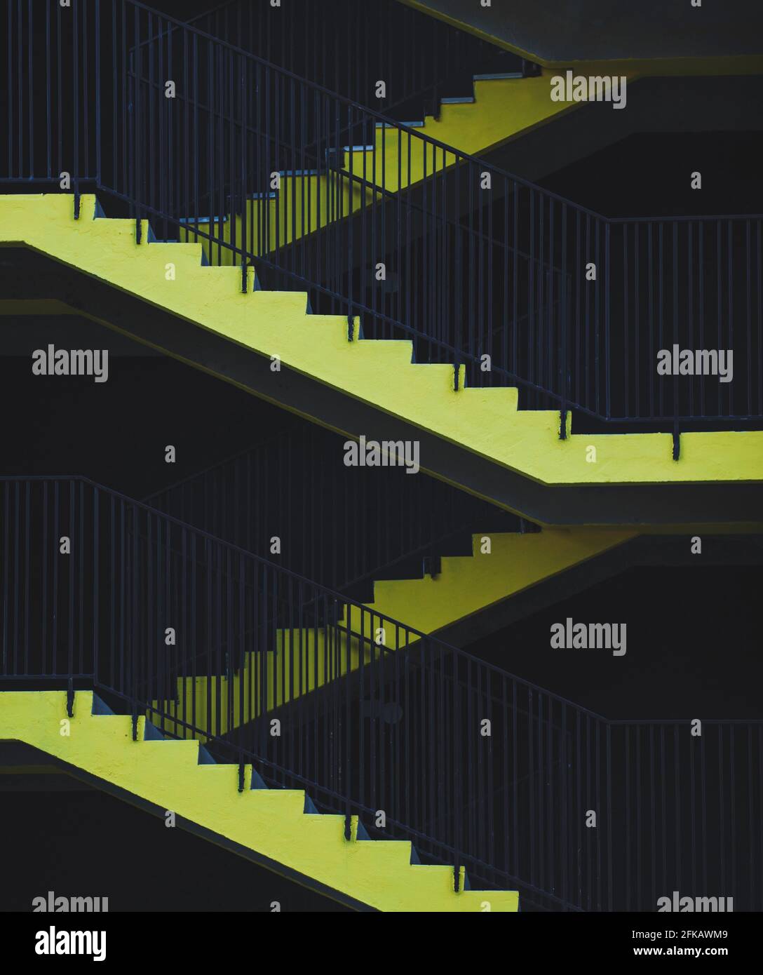 emergency exit. yellow stairs of the parking lot Stock Photo - Alamy