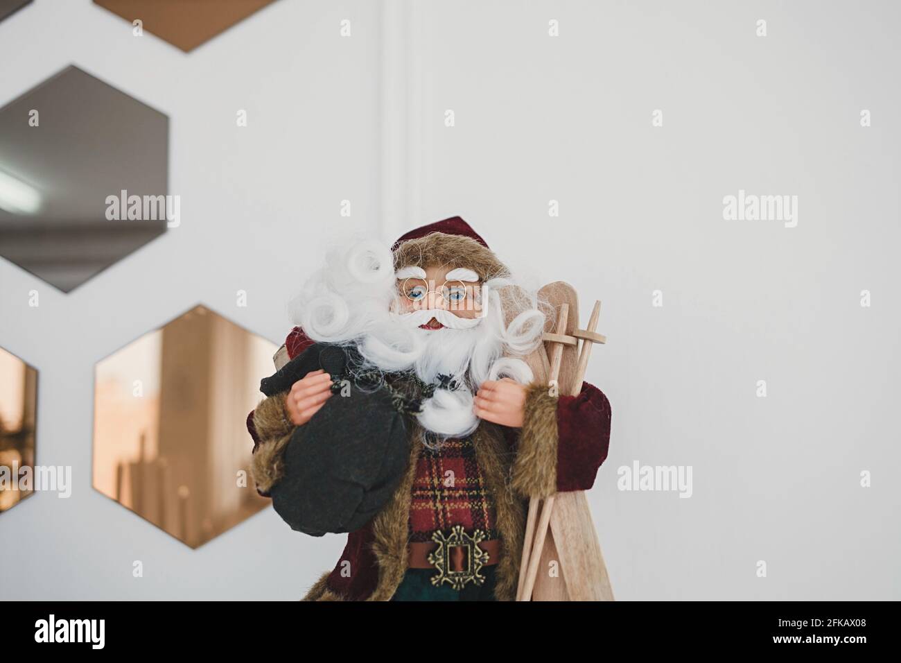 fabric santa claus christmas decoration in room Stock Photo - Alamy