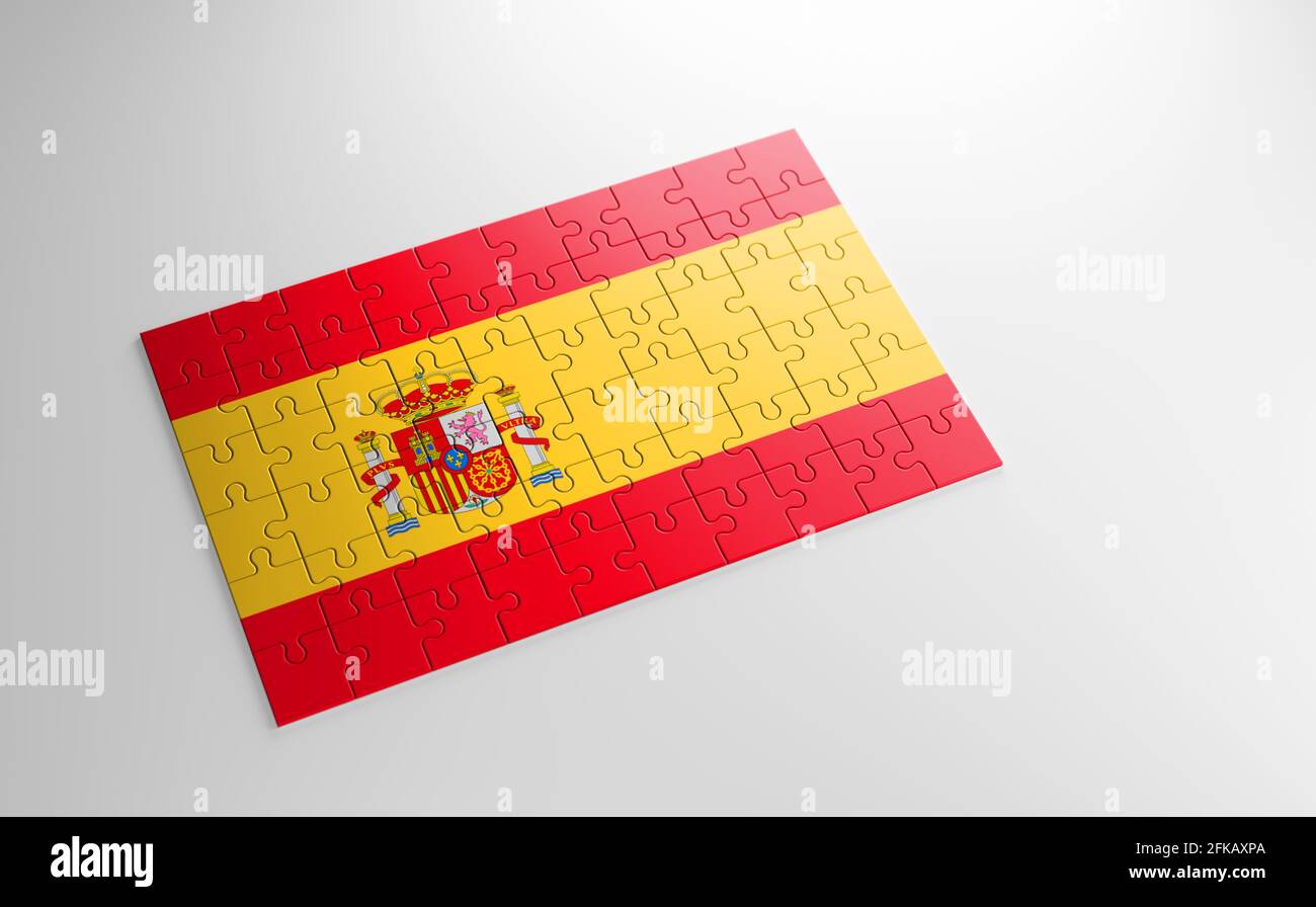 A jigsaw puzzle with a print of the flag of Spain, pieces of the puzzle ...