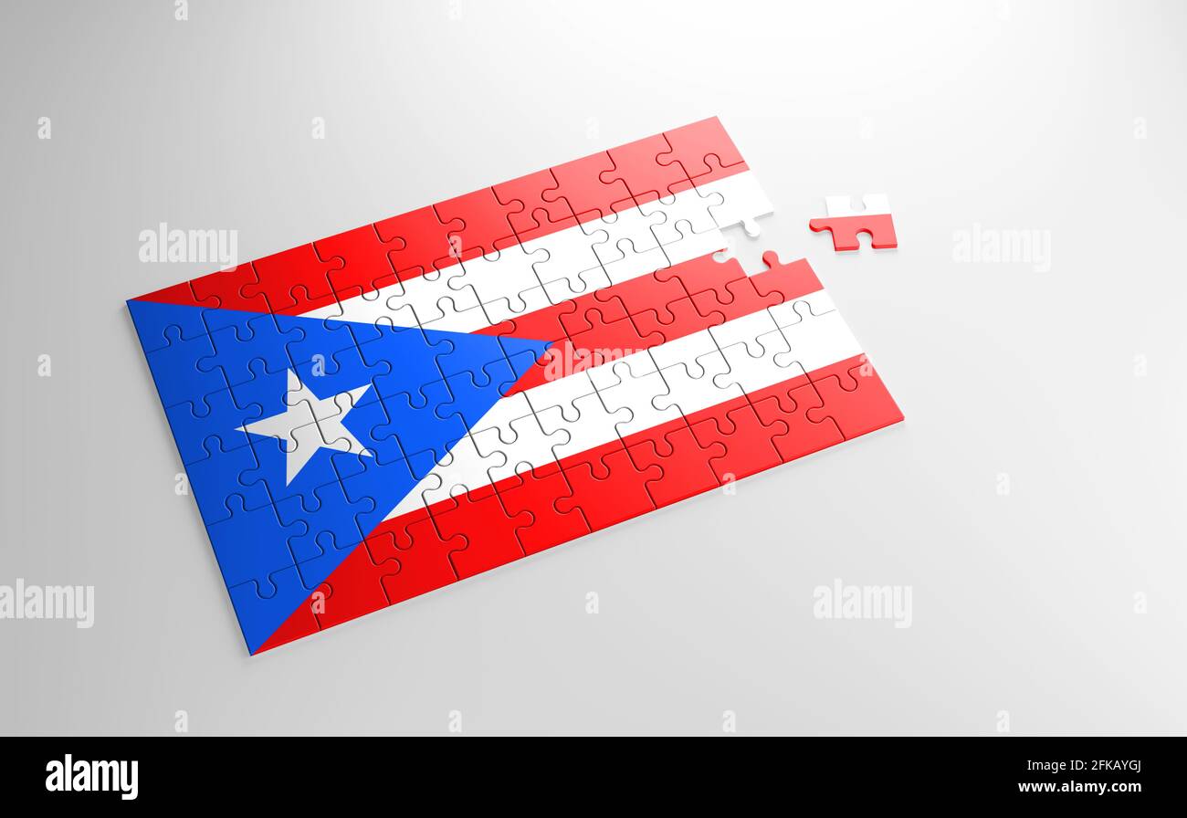 A jigsaw puzzle with a print of the flag of Puerto Rico, pieces of the ...