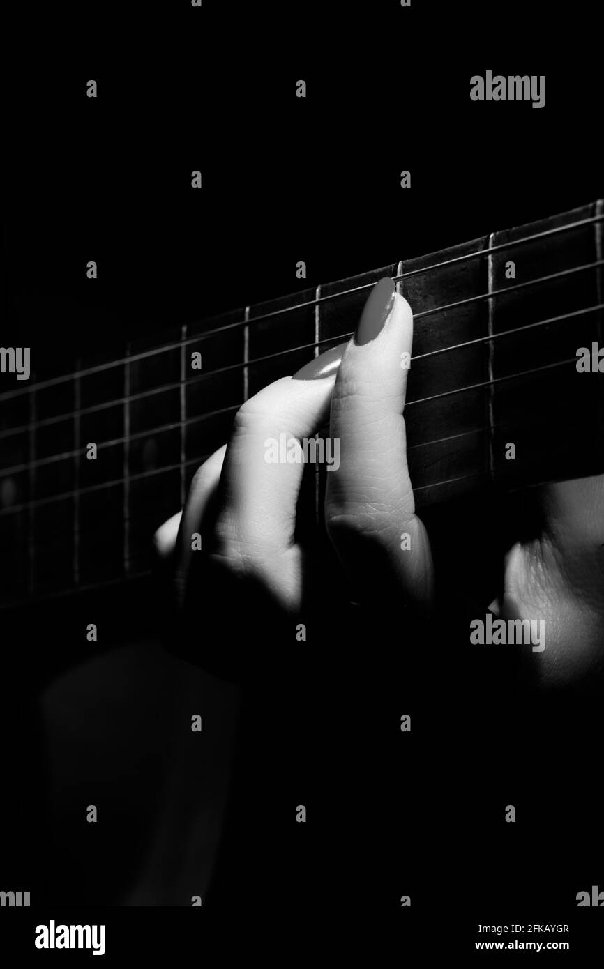 Guitar chord player Black and White Stock Photos & Images - Alamy