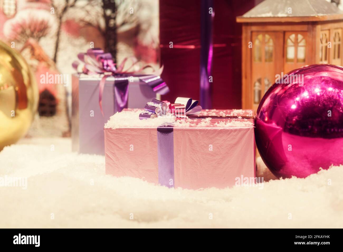 Christmas gifts and boxes in the shop window Stock Photo - Alamy