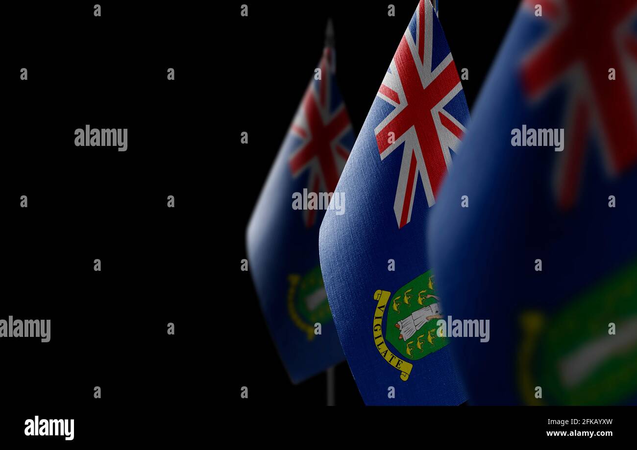 Small national flags of the British Virgin Islands on a black ...