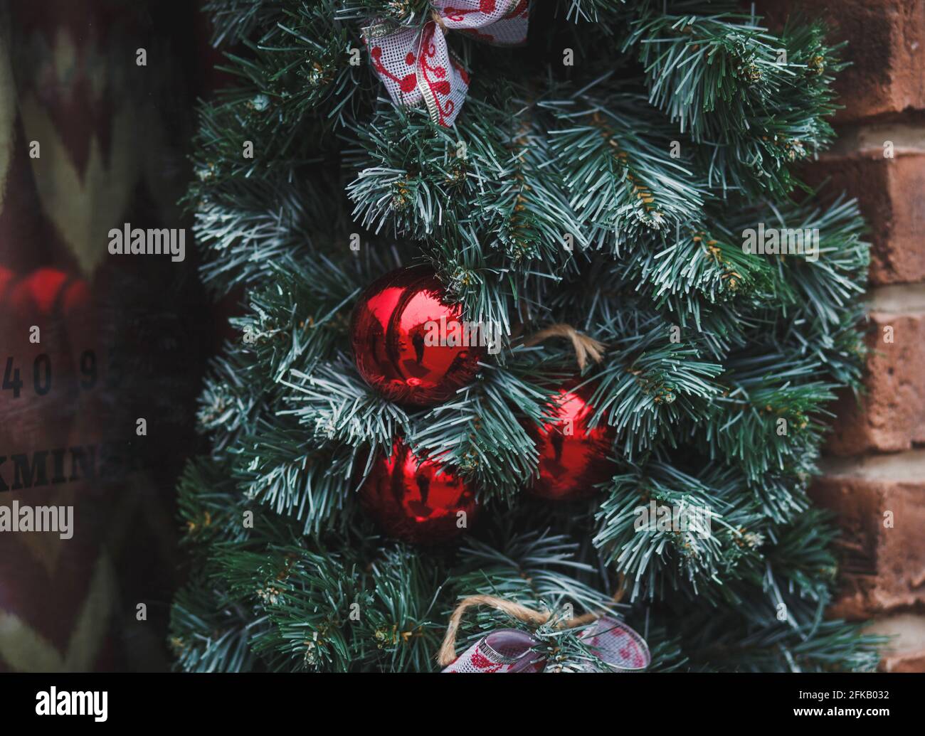 beautiful decorated christmas tree with red balls Stock Photo - Alamy