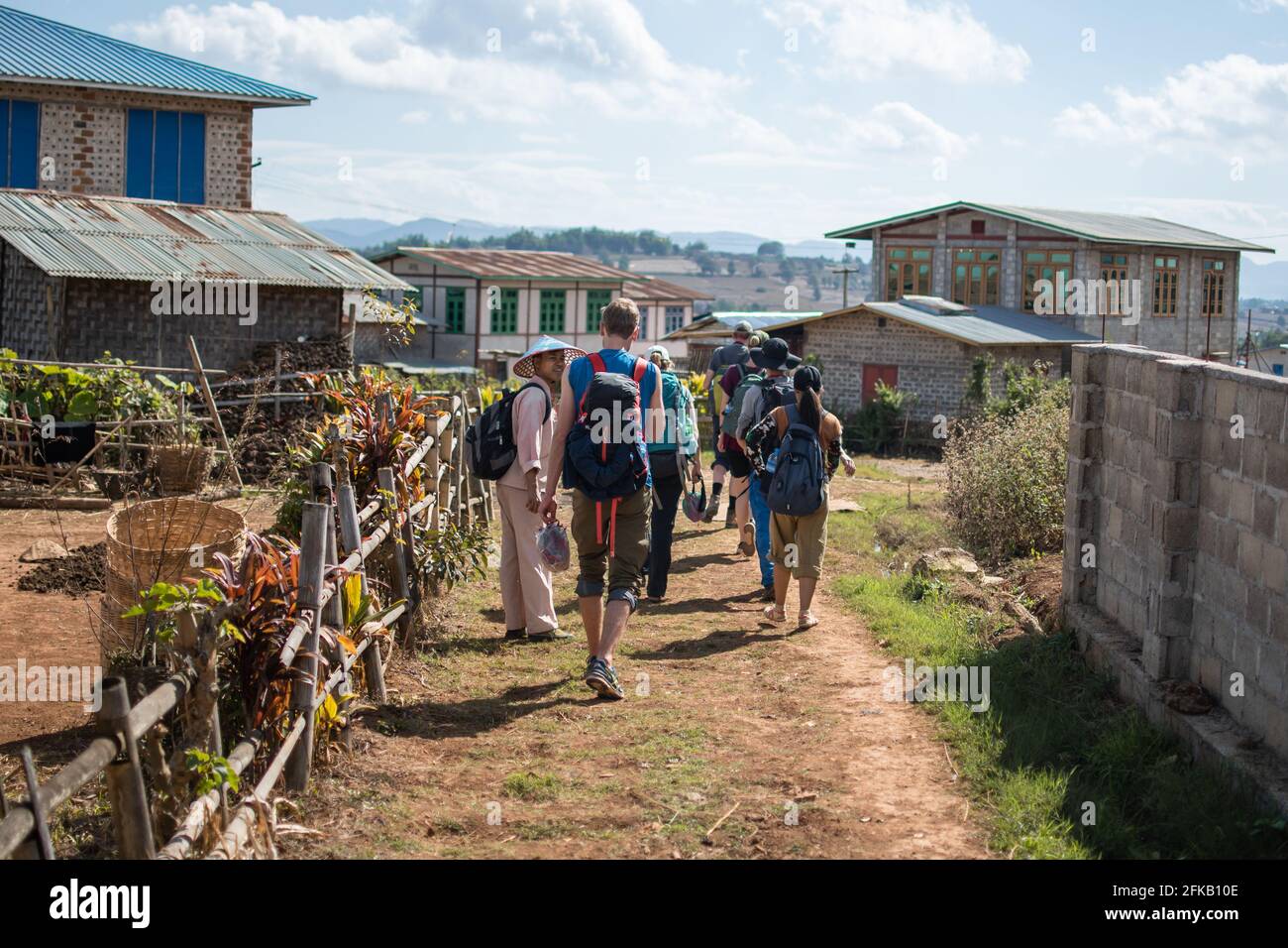 Shan state, Myanmar - January 6 2020: A tourist group with backpacks ...