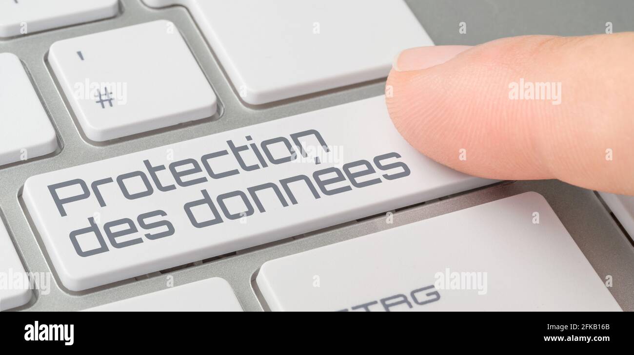A keyboard with a labeled button - Data security in french - Protection ...