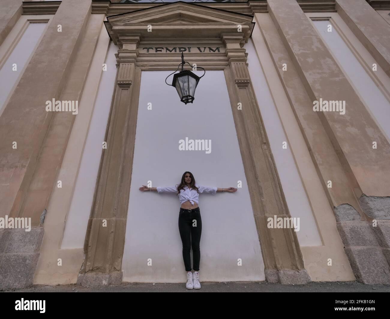 Girl prays outside the fake temple, Lombardy, Italy Stock Photo - Alamy