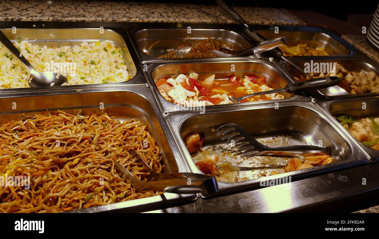 ready meals in an Asian Take Away restaurant with steel trays Stock ...