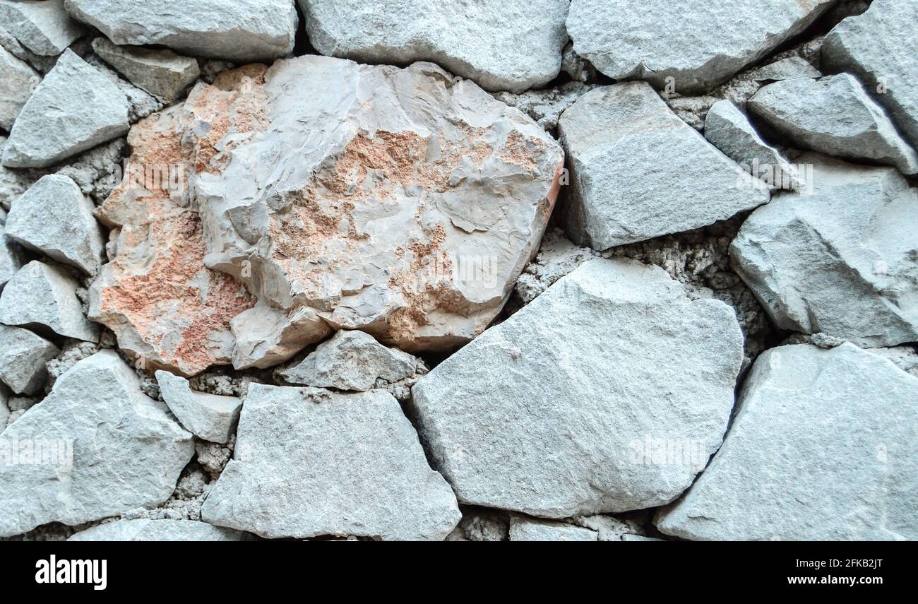 Stone wall background texture, grey rough stone Stock Photo - Alamy