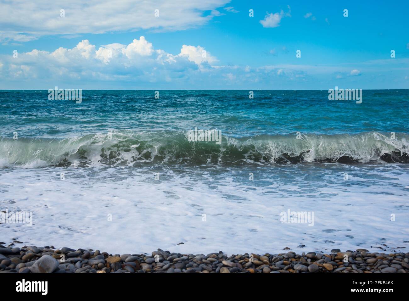 Deep sea water waves. Pebble beach on the Black Sea coast Stock Photo ...