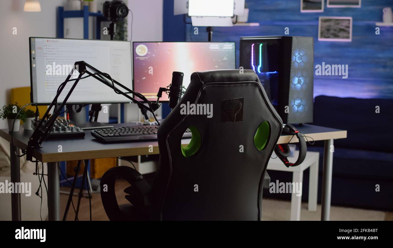 Streaming professsional microphone in empty gaming home studio with ...