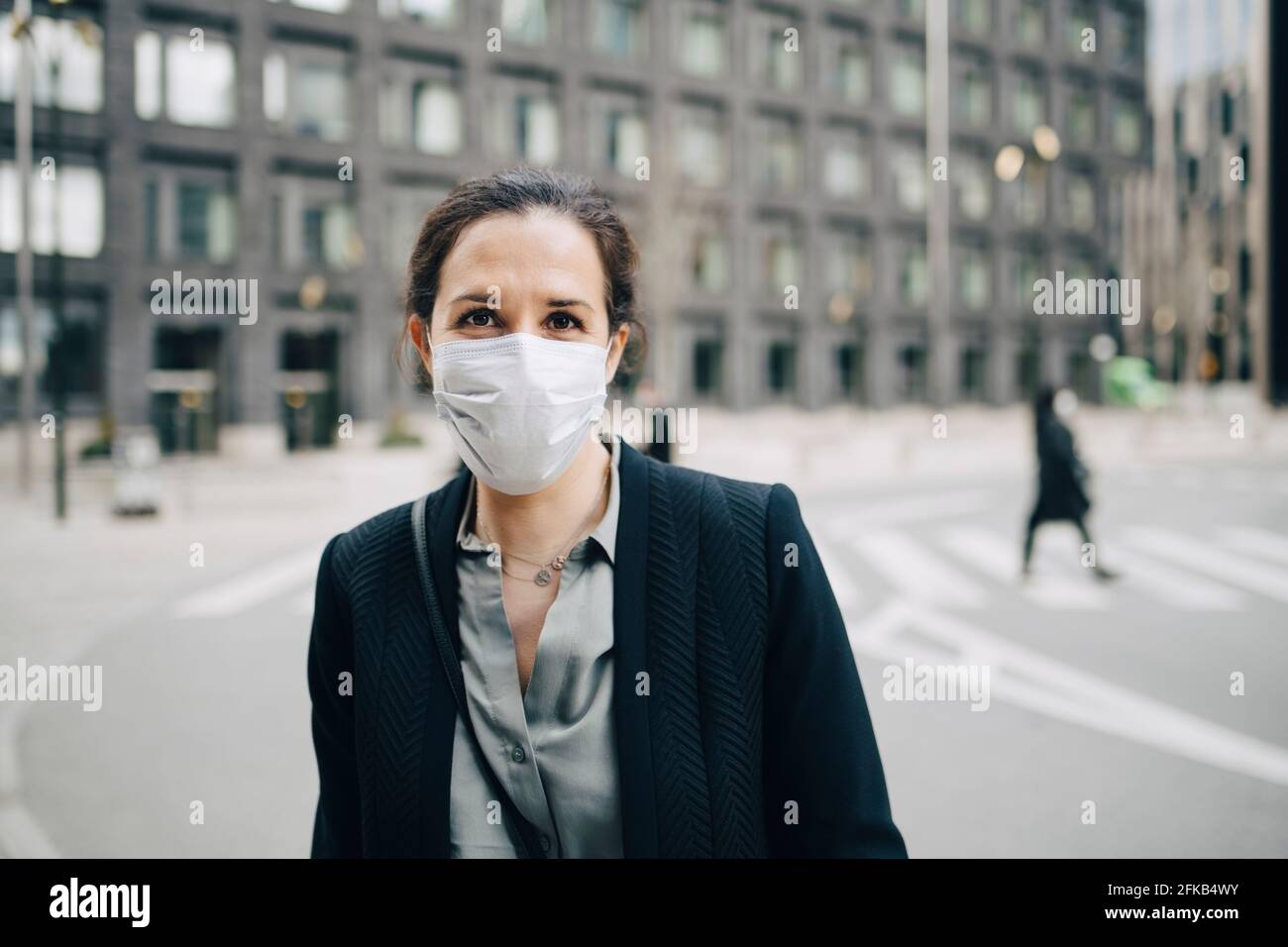 Female professional in mask hi-res stock photography and images - Alamy
