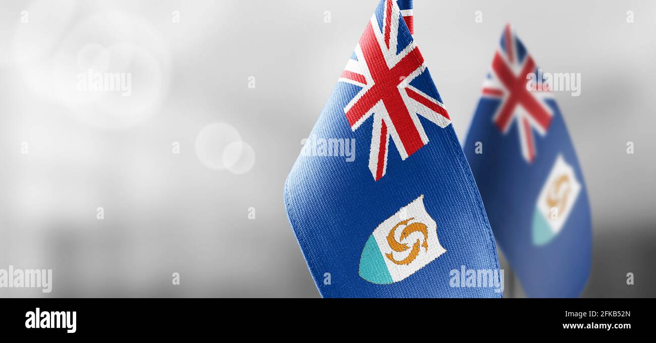 Small national flags of the Anguilla on a light blurry background Stock ...